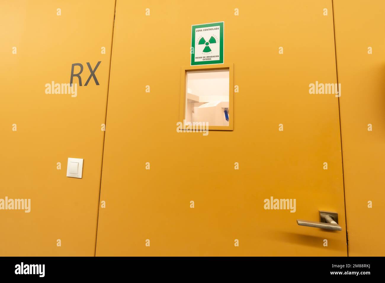 Corridor of a dental clinic with multiple boxes and the x-ray room ...