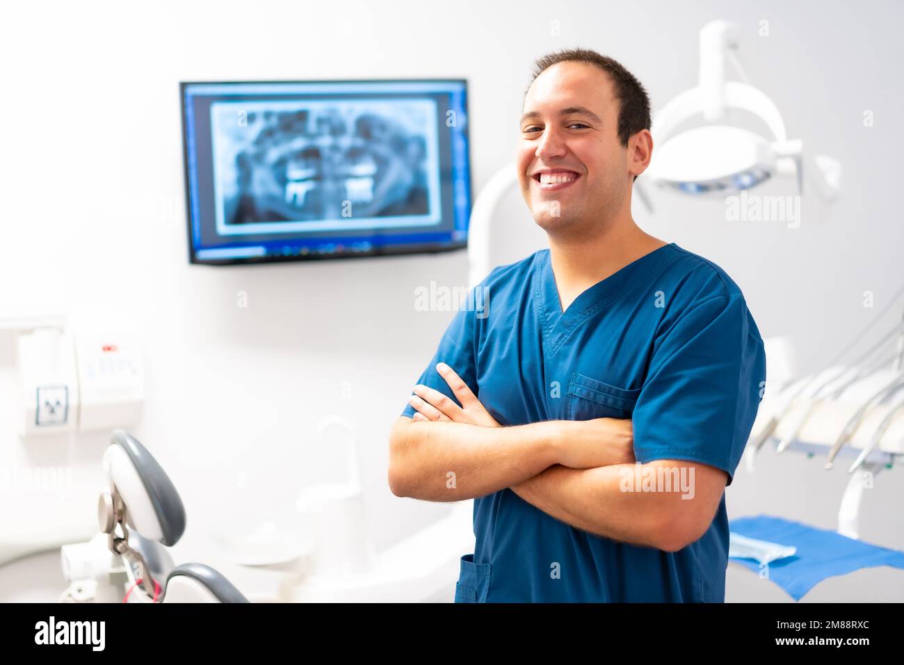 Dental clinic, portrait of caucasian female dentist with arms crossed ...