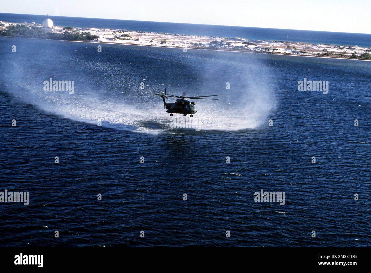 An MH-53H helicopter of the 1ST Special Operations Wing hovers over the ...
