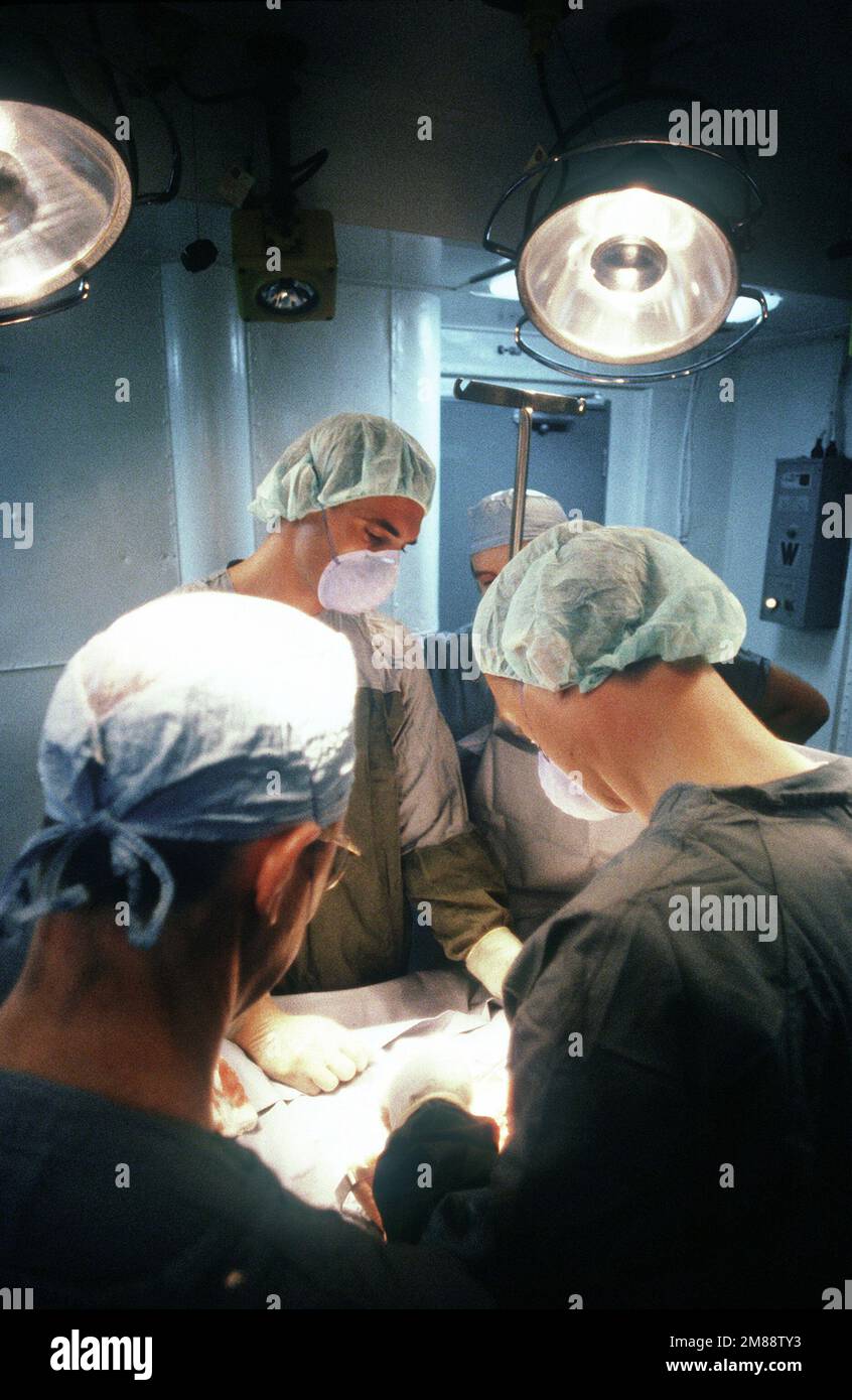 LT. CMDR. (Dr.) Johnny B. Green, left, Dr. Thomas A. Tallman, center ...