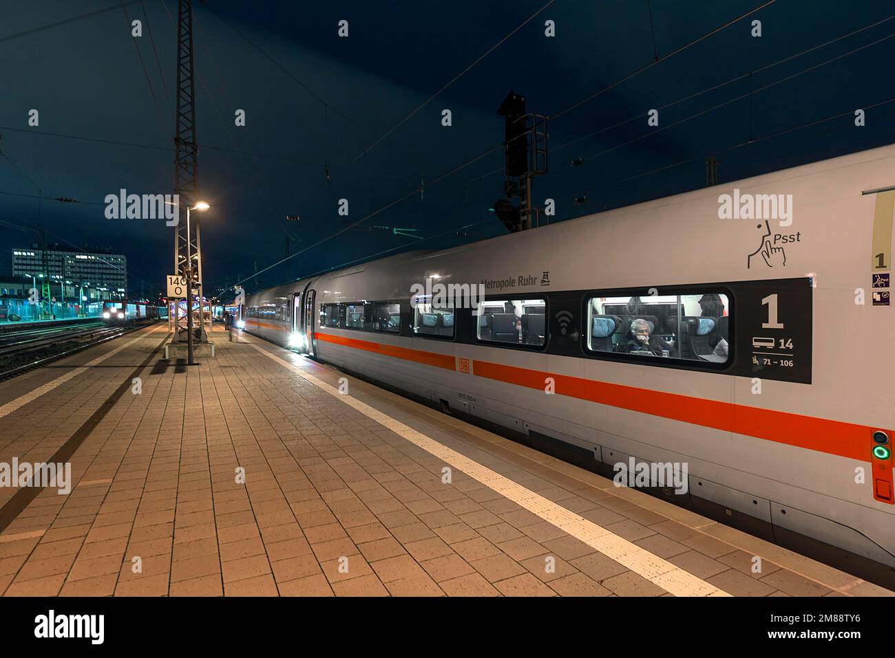 Nightly stop of an ICE Intercity Express at a railway station ...