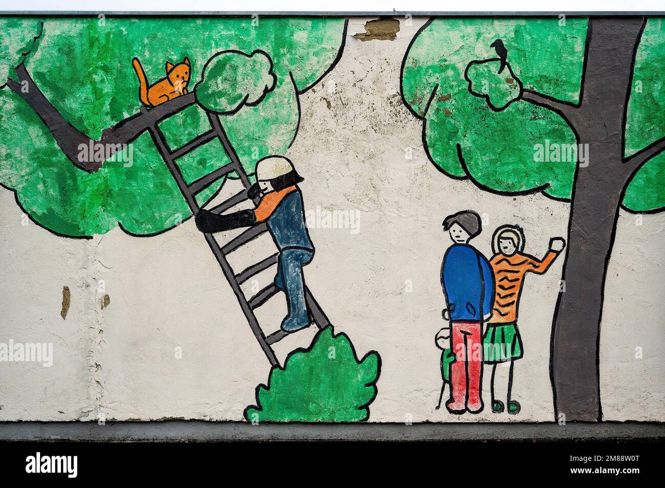 Childlike painting on decaying wall, fireman fetches a cat from a tree ...