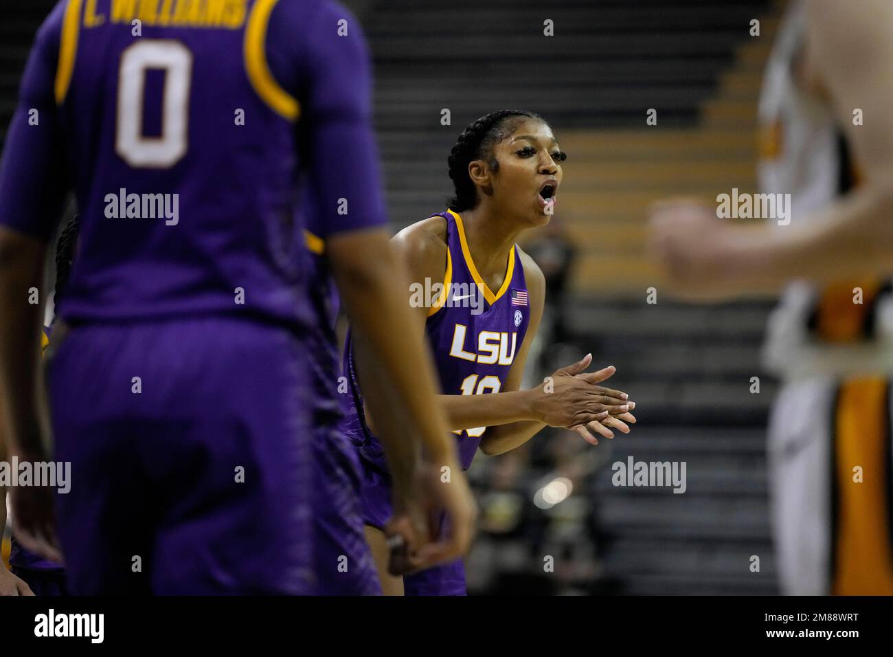 LSU's Angel Reese cheers on her team during the second half of an NCAA ...