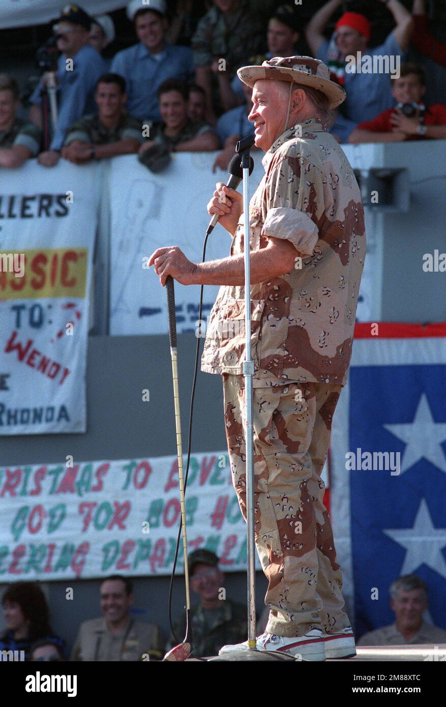 Entertainer Bob Hope, dressed in desert camouflage fatigues, during a ...