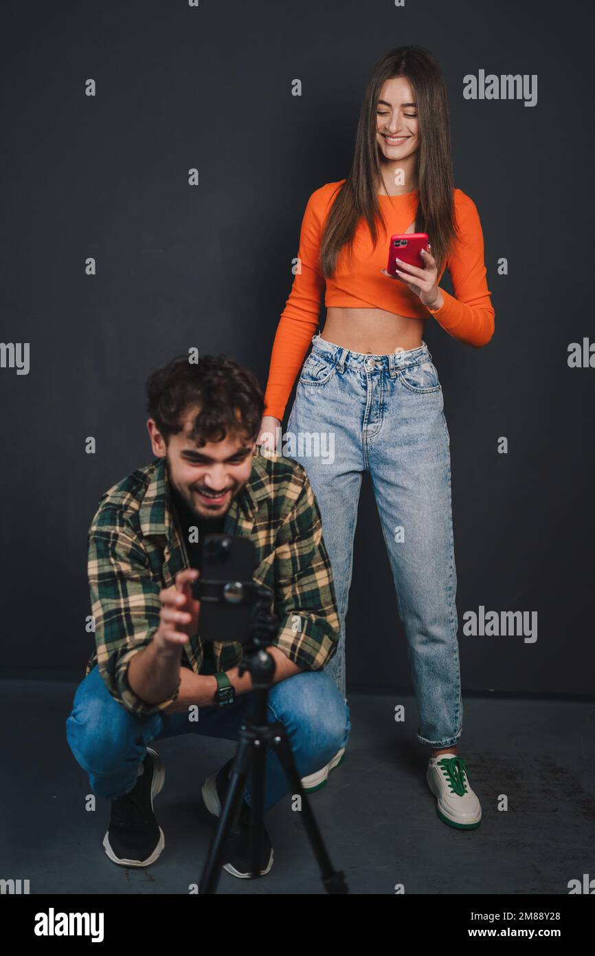 Stylish two teen bloggers shooting trendy dance for social media ...