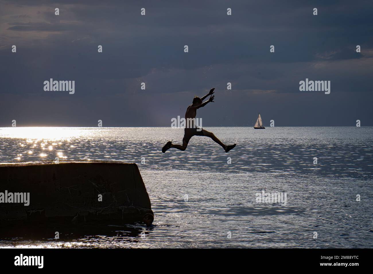 Pier jump hi-res stock photography and images - Alamy