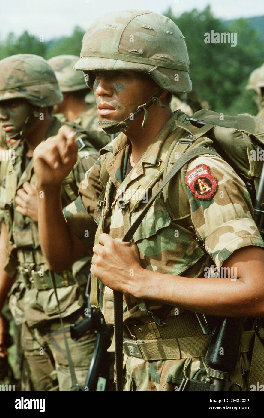 A Honduran soldier prepares to move out on patrol with his unit during ...