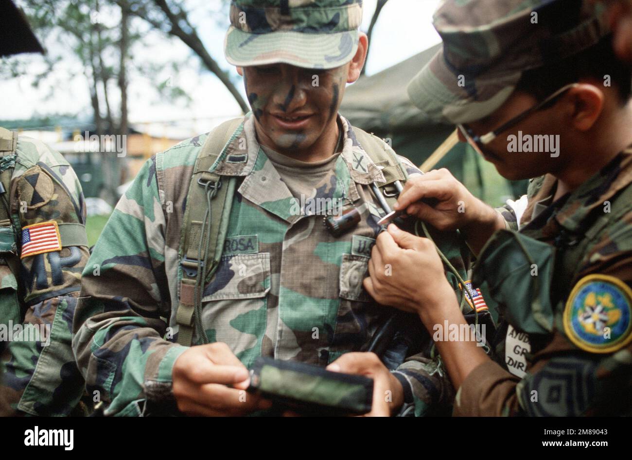 A Honduran soldier and 1LT Santos de la Rosa, left, 7th Infantry ...