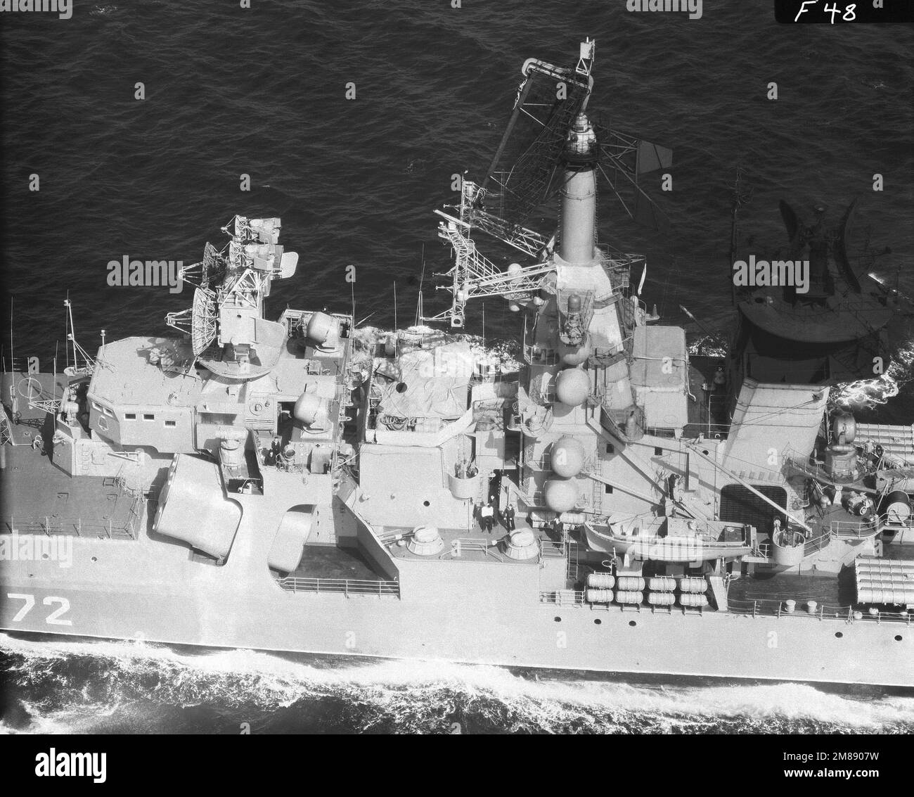 A port side amidships view of the Soviet Kresta II class guided missile ...