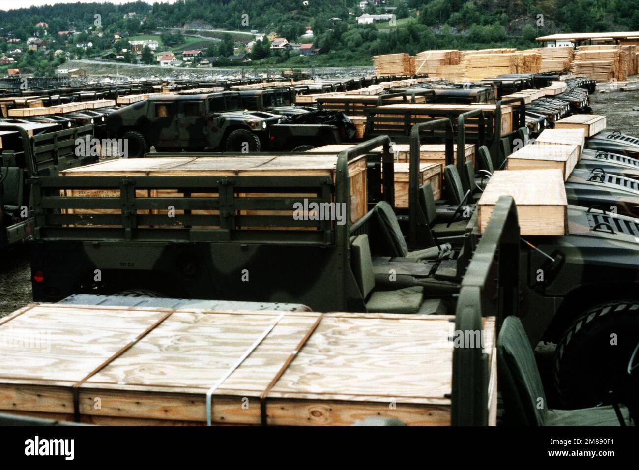 U.S. Marine drives an M998 High-Mobility Multipurpose Wheeled Vehicles ...