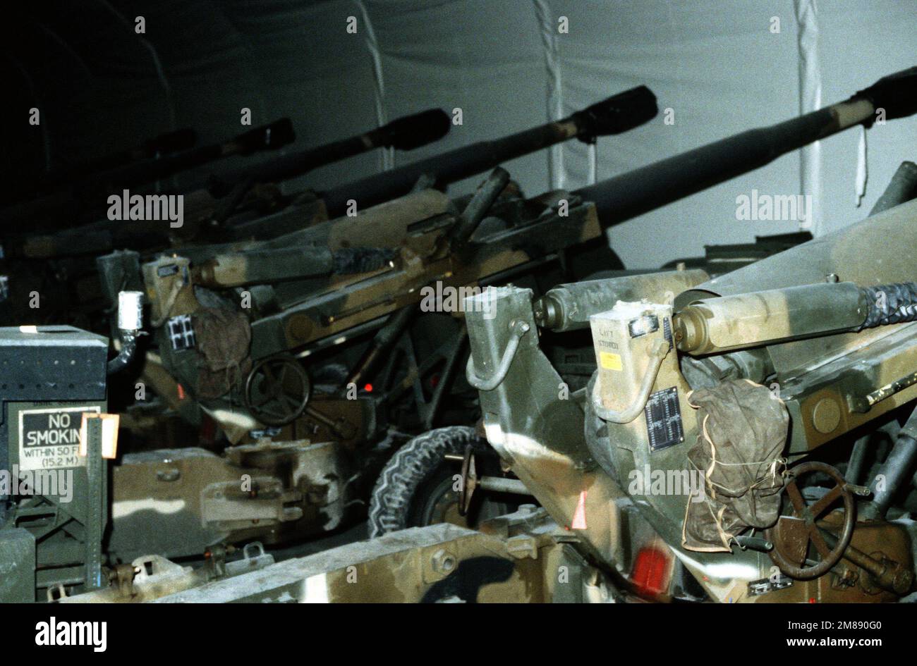 M-198 155mm towed howitzers are stored in a prepositioning cave which ...