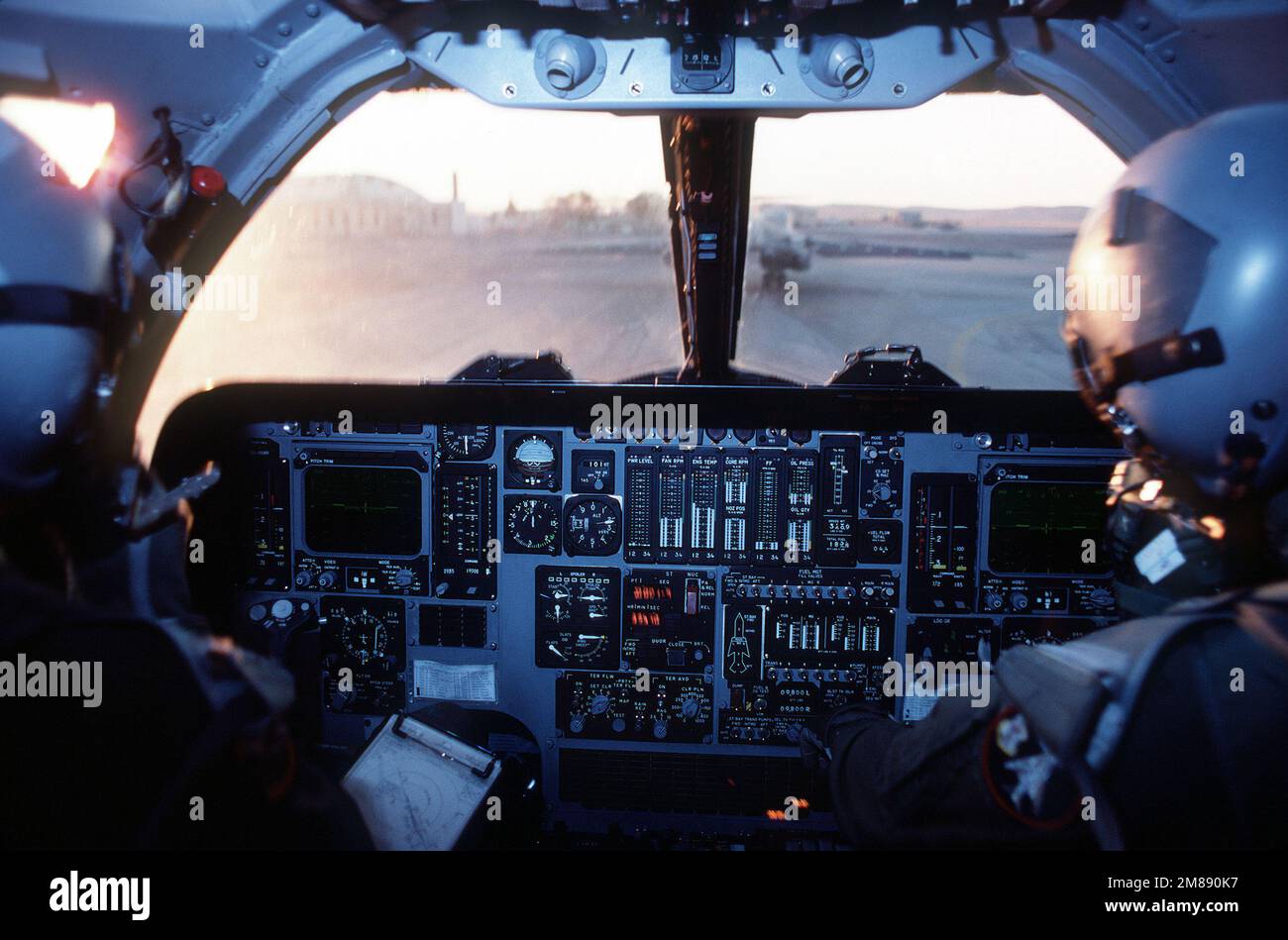 An interior view of the cockpit of a B-1B bomber aircraft as the crew ...