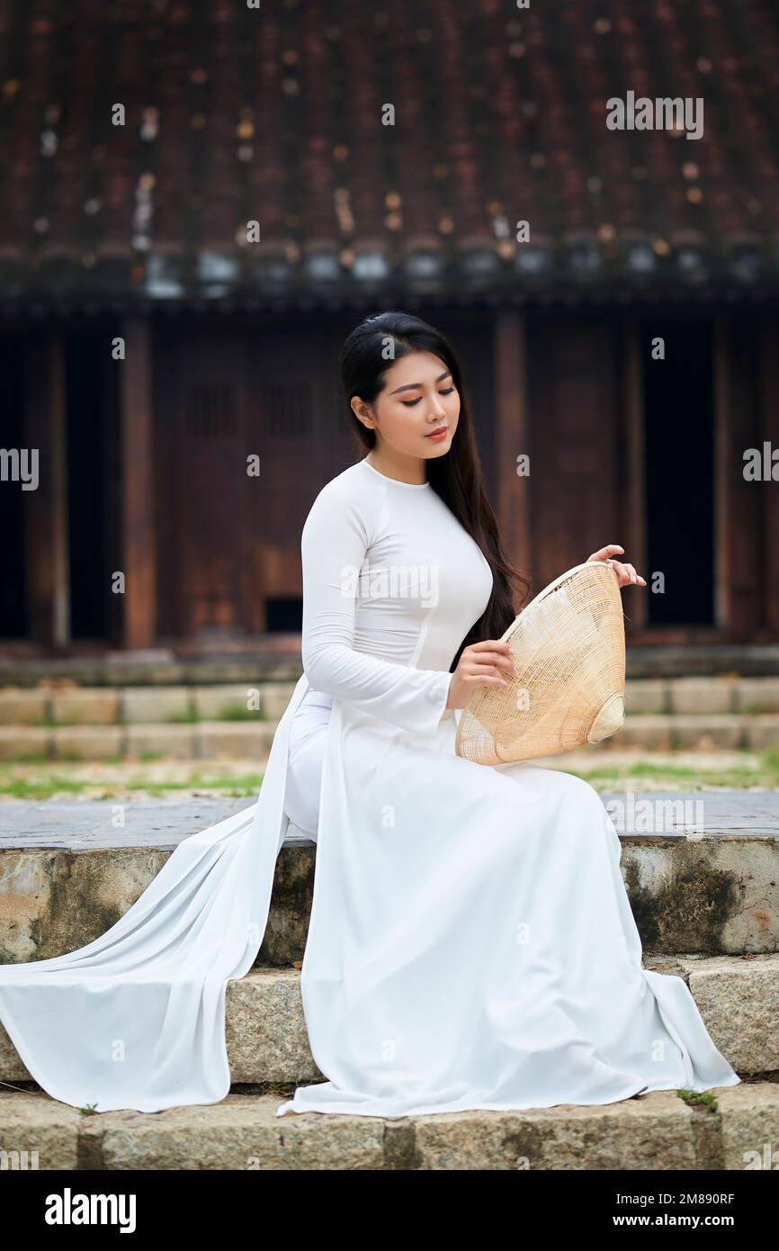 Ho Chi Minh city, Viet Nam: Ao Dai is traditional dress of vietnam, beautiful vietnamese woman ...