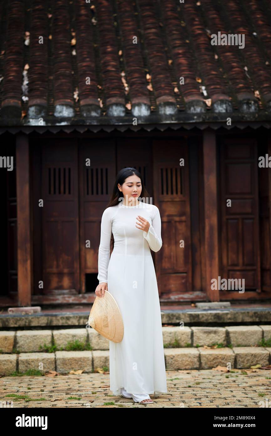 Ho Chi Minh city, Viet Nam: Ao Dai is traditional dress of vietnam, beautiful vietnamese woman ...