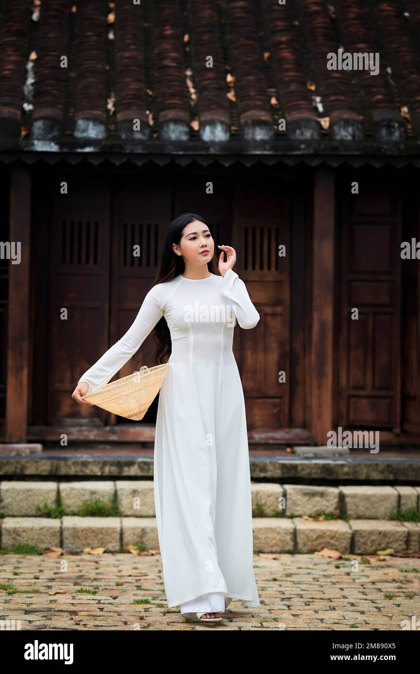Ho Chi Minh city, Viet Nam: Ao Dai is traditional dress of vietnam, beautiful vietnamese woman ...