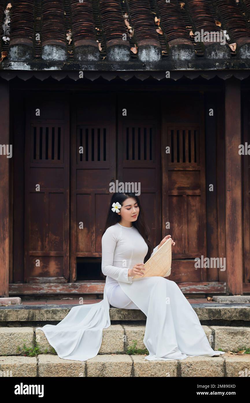 Ho Chi Minh city, Viet Nam: Ao Dai is traditional dress of vietnam, beautiful vietnamese woman ...