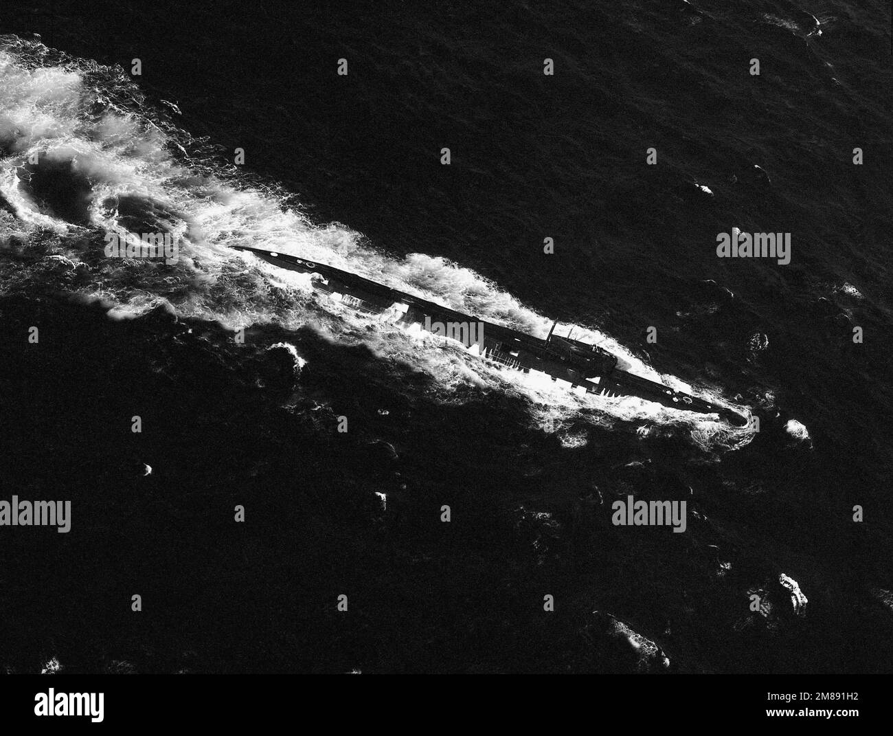 A aerial starboard view of a Modified Echo II class Soviet submarine ...