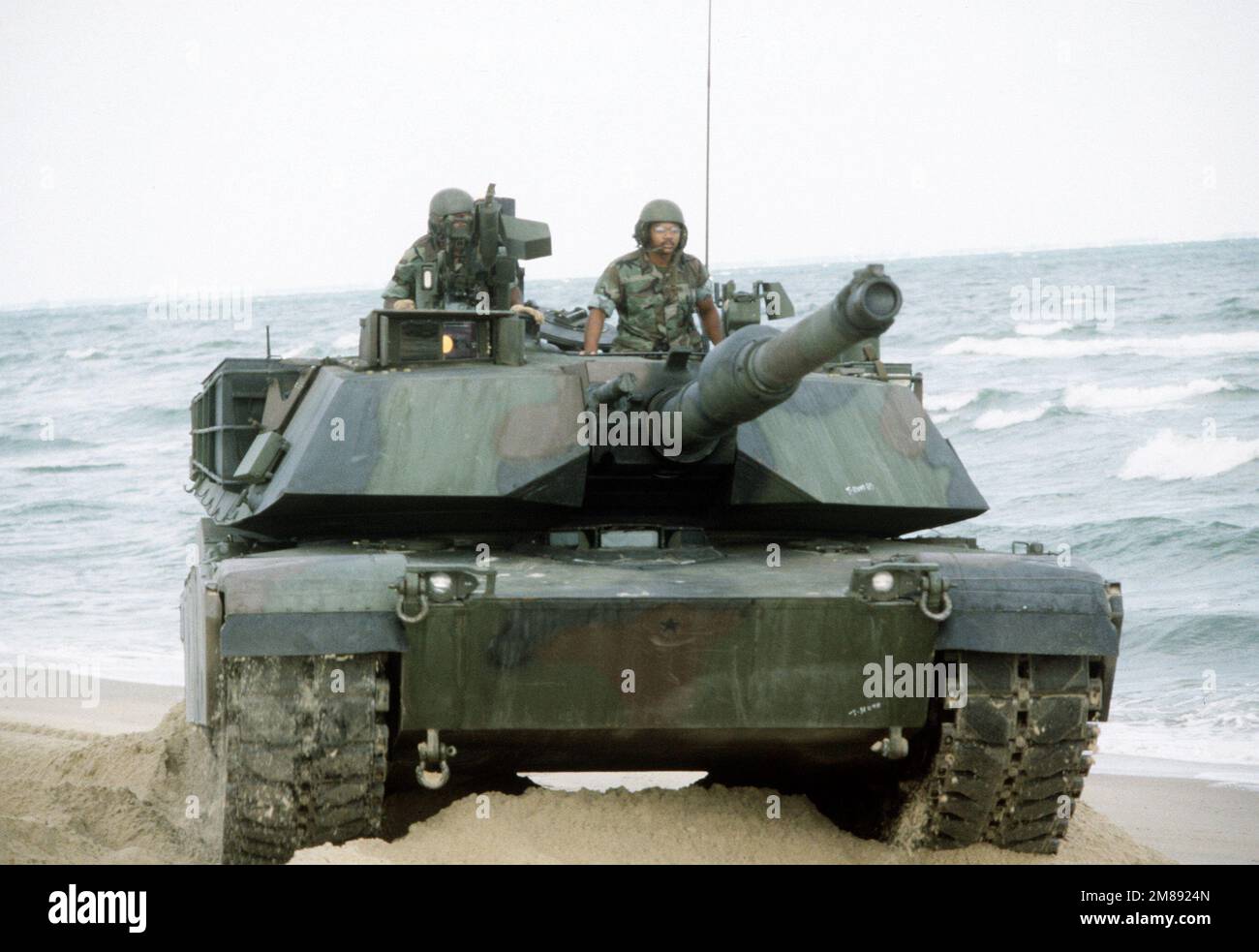 A front view of a Marine M-1A1 main battle tank on the beach after ...
