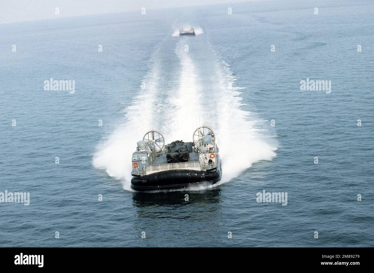 A bow view of air cushion landing craft LCAC-12 underway near Naval ...