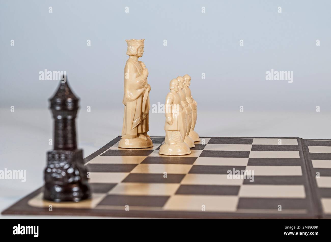 Checkmate! The light king is at B1, the light pawns are at A2, B2, and ...