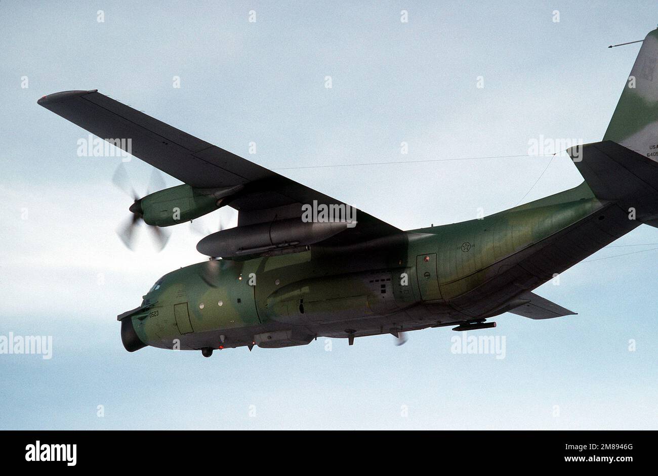 An air-to-air left side view of a 7th Special Operations Squadron ...