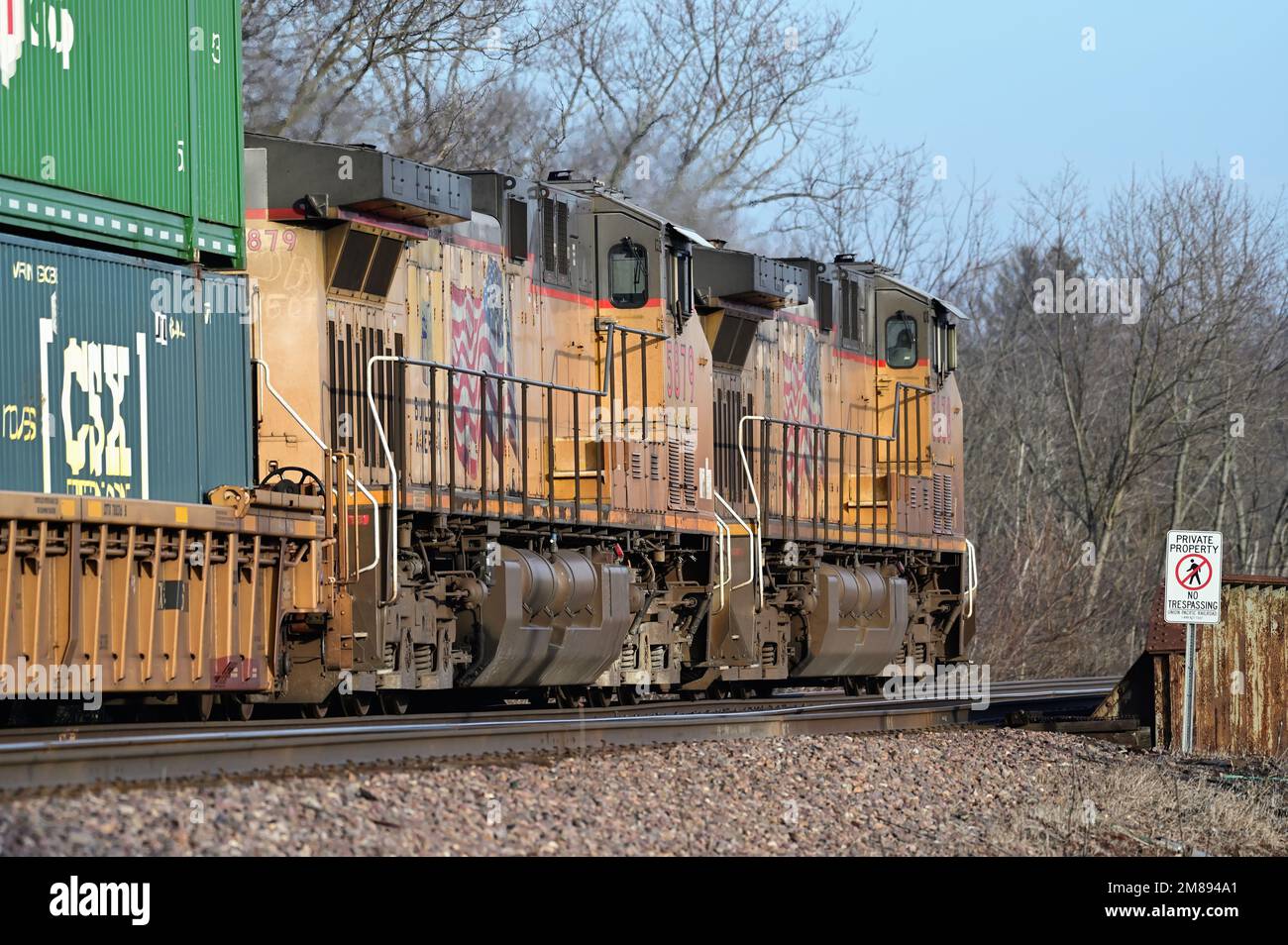 Geneva, Illinois, USA. Two Union Pacific Railroad locomotives lead an intermodal freight train ...