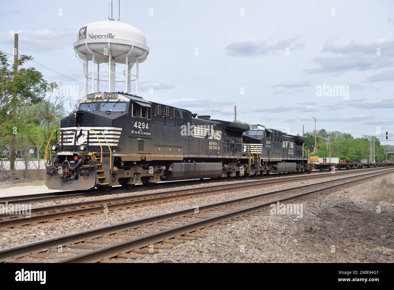 Naperville, Illinois, USA. Two run-through Norfolk Southern Railway locomotives lead a ...