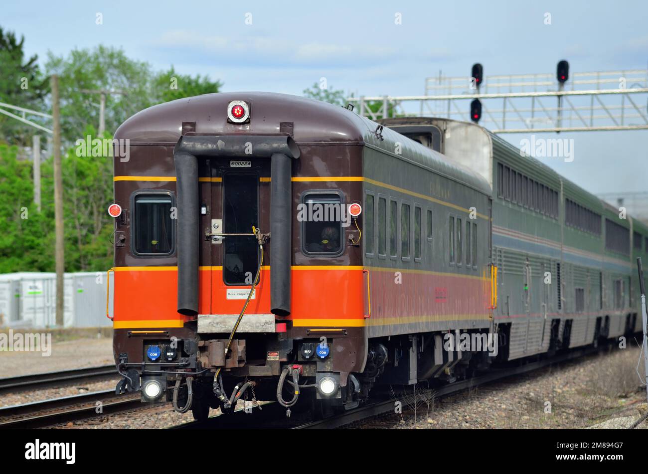 Naperville, Illinois, USA. A private car coupled to the rear of Amtrak ...