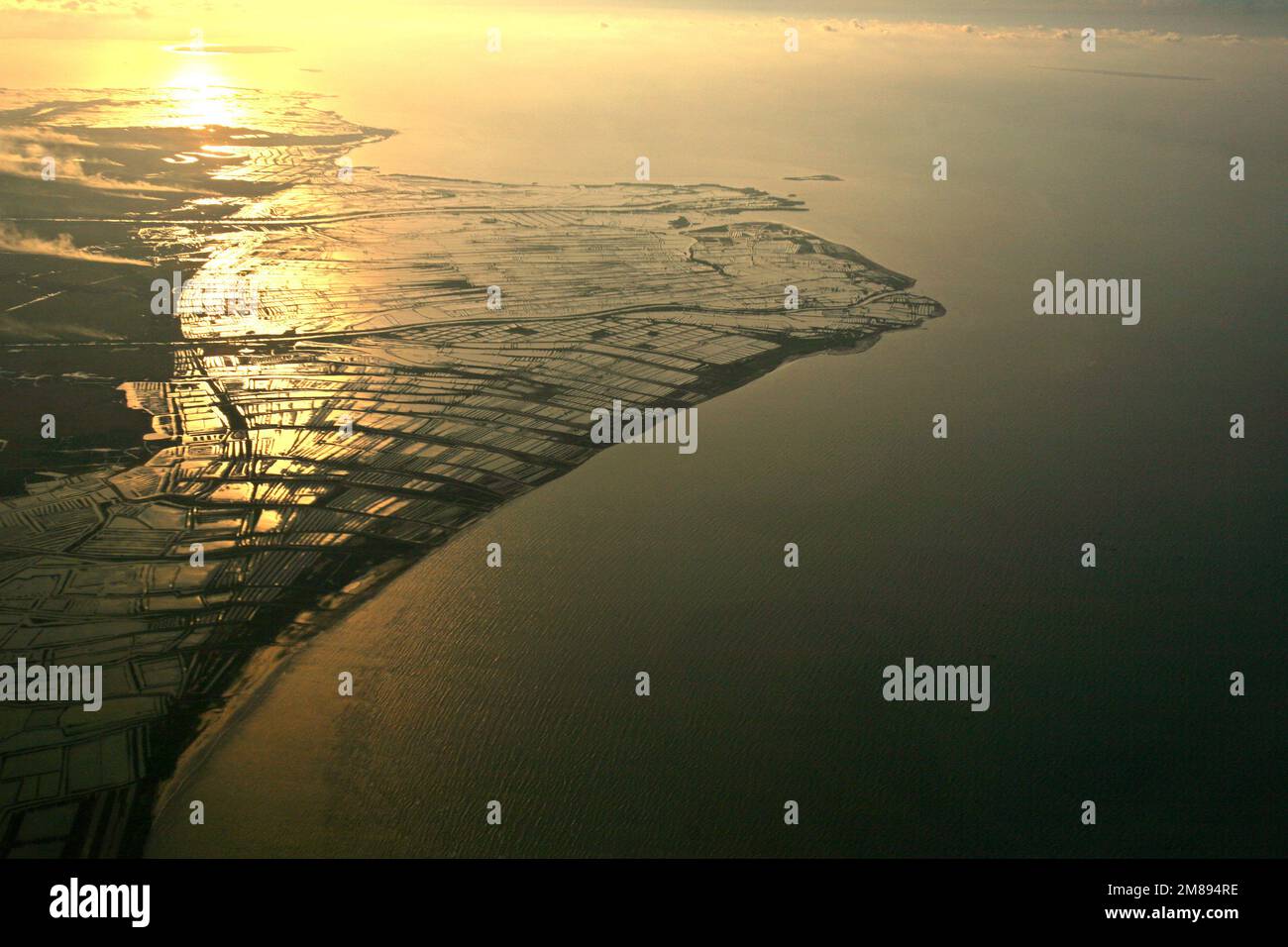 Aerial view of coastal landscape showing aquaculture farms and salt ...