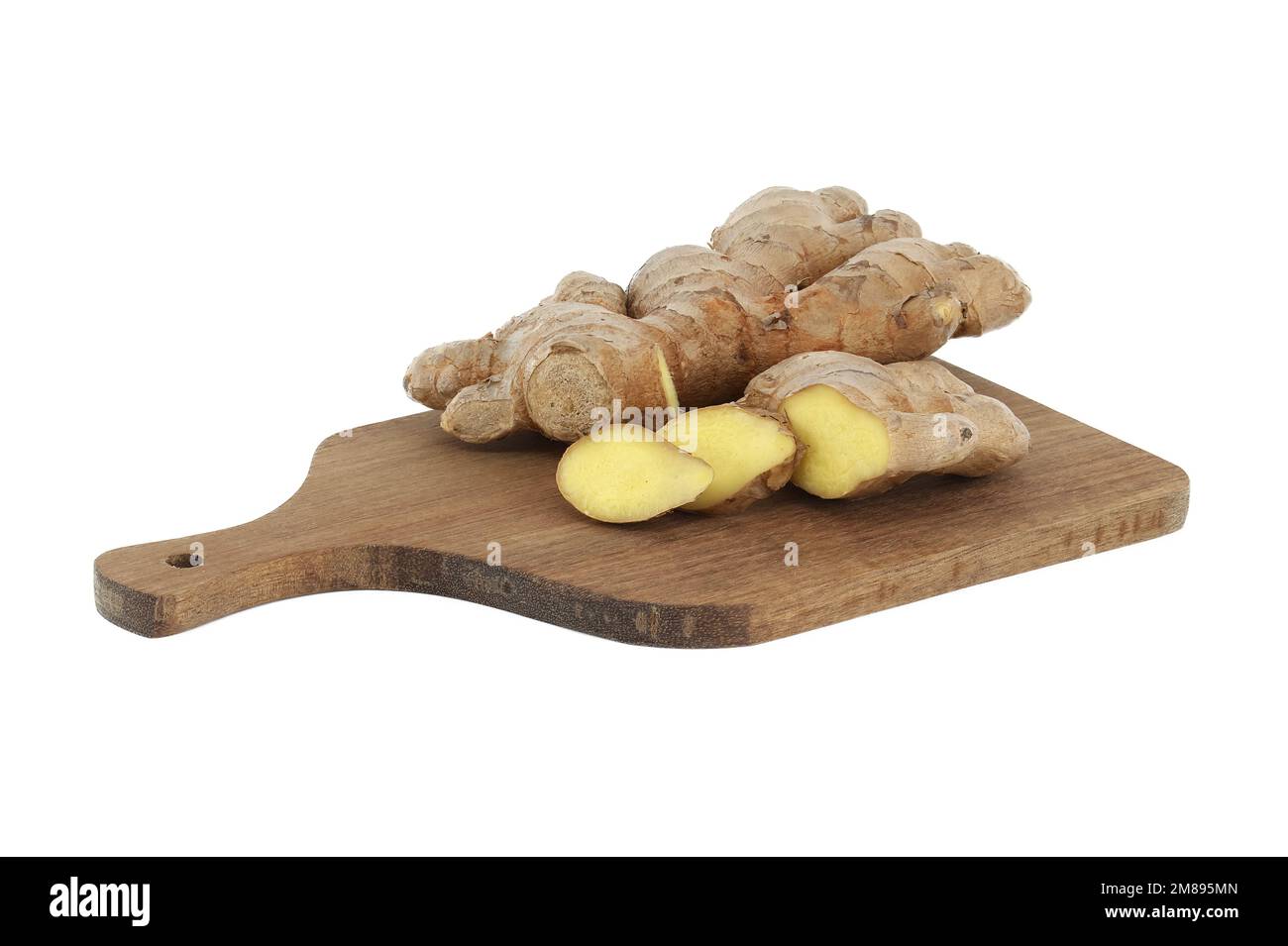 Fresh ginger root with slices on wooden cutting board isolated on white ...