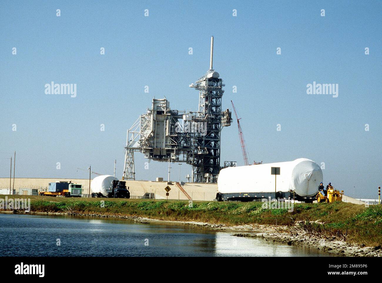 The first and second stages of a Titan IV launch vehicle are ...