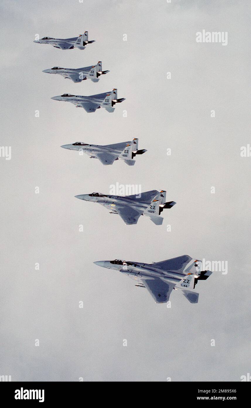 An air-to-air left side view of 18th Tactical Fighter Wing F-15 Eagle ...