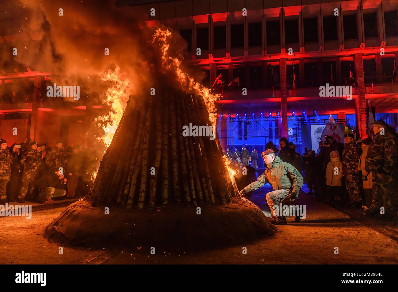 Lithuanian soldier lights a bonfire at the Independence Square near the ...