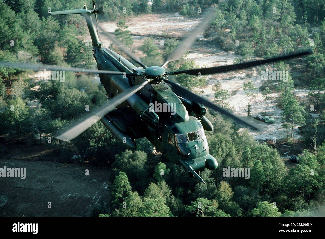 A 20th Special Operations Squadron MH-53H Pave Low III helicopter flies ...