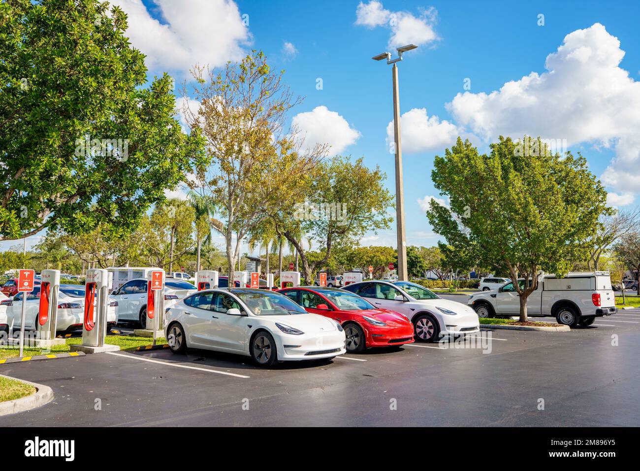 Davie, FL, USA - January 12, 2023: Tesla supercharger at Tower Shops ... Davie, FL, USA - January 12, 2023: Tesla supercharger at Tower Shops ...