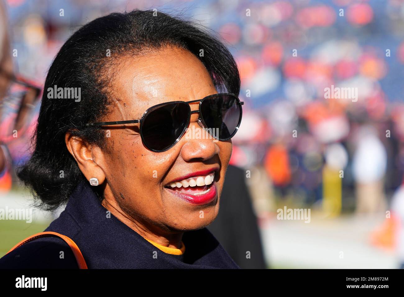 Denver Broncos owner Condoleezza Rice looks on before an NFL football ...