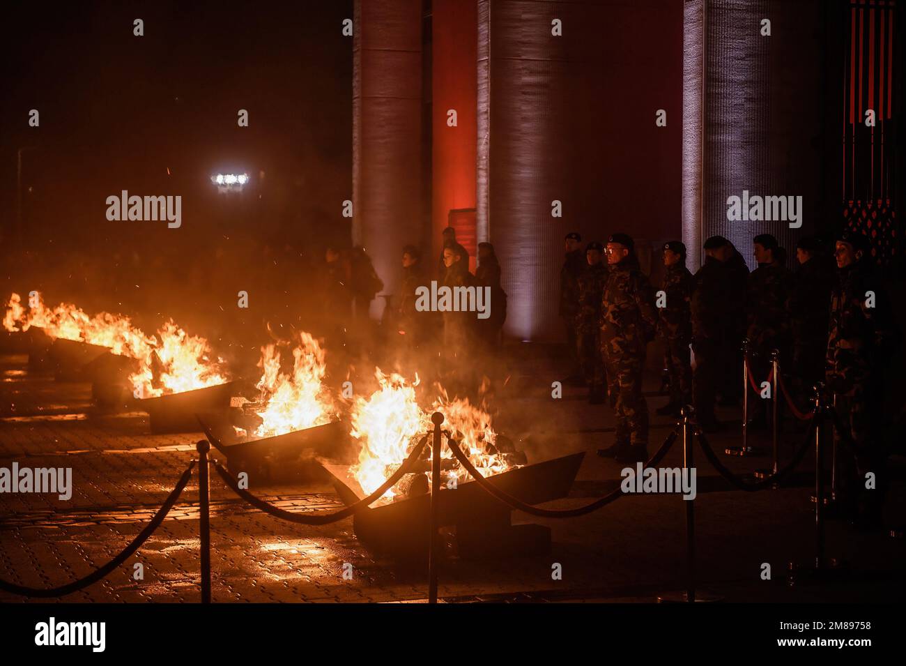 Lithuanian soldiers stand on guard as bonfires burn at the Independence ...