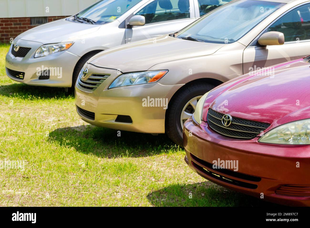 The Toyota logo is located on the front of the vehicle Stock Photo - Alamy