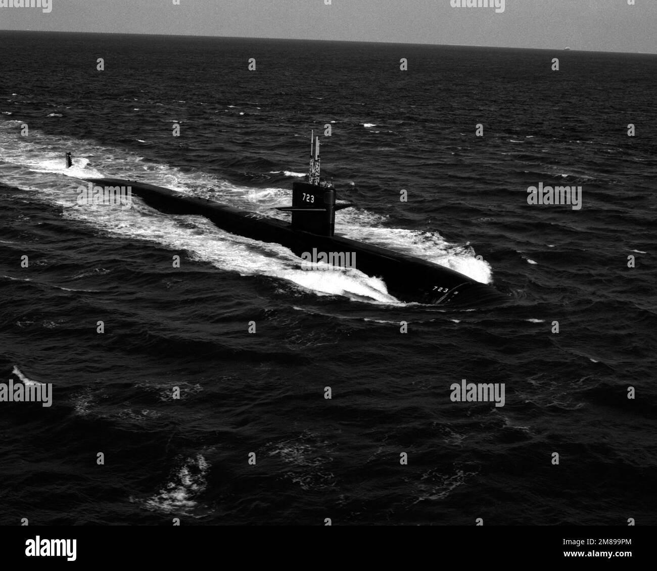 A starboard bow view of the nuclear-powered attack submarine USS ...