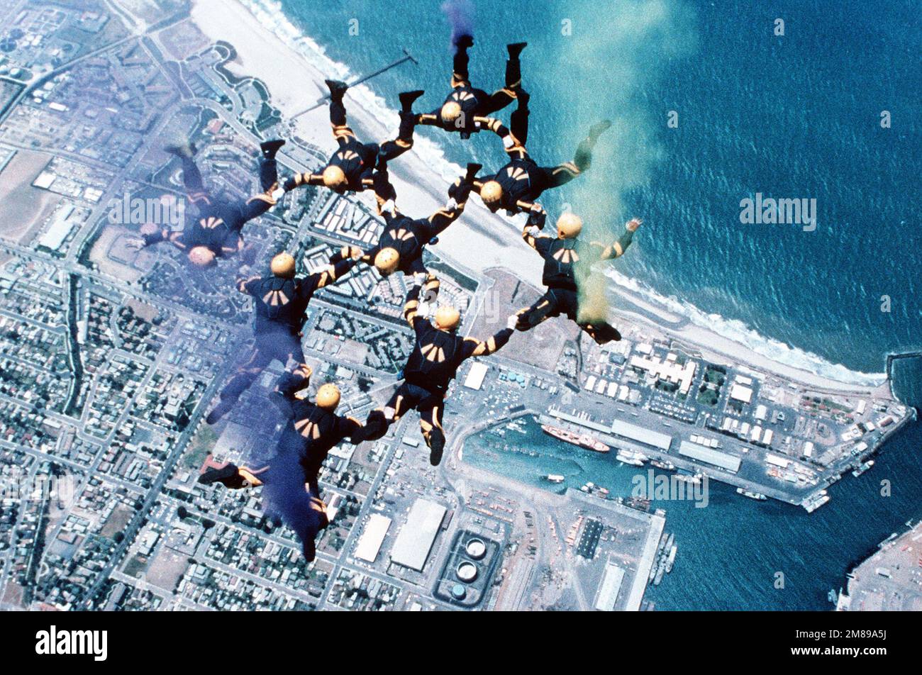 Members of the "Leapfrogs," the Navy's Parachute Team, form a 9-man ...