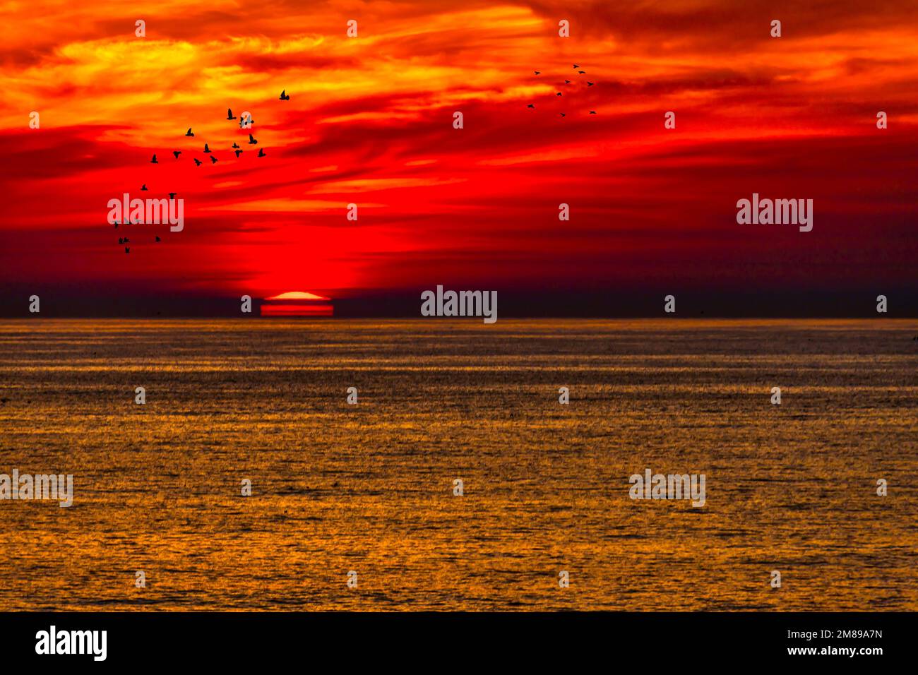Sinking Setting Sun Stock Photo - Alamy