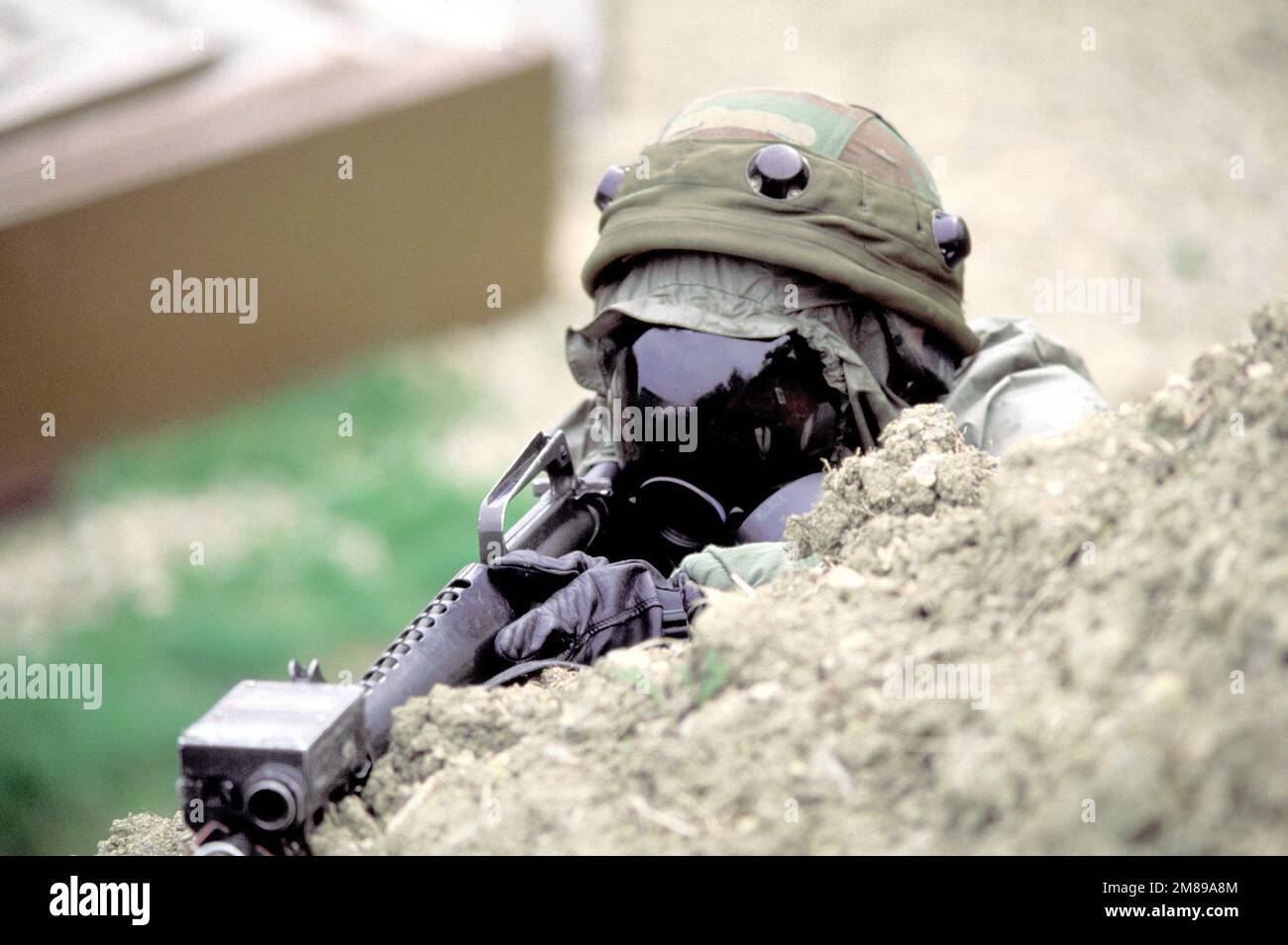 A member of the base security police squadron wearing a Mark 2 chemical ...