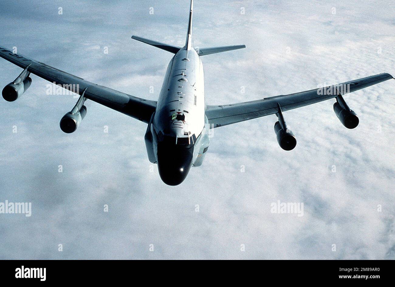 An air-to-air front view of an RC-135 Stratolifter aircraft from the ...