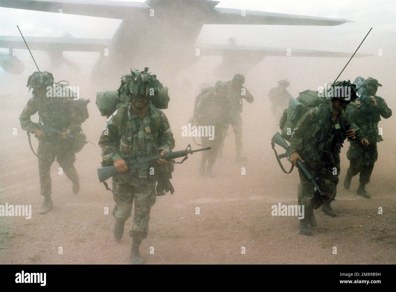 Members of the 7th Light Infantry Division are deployed in the field by ...