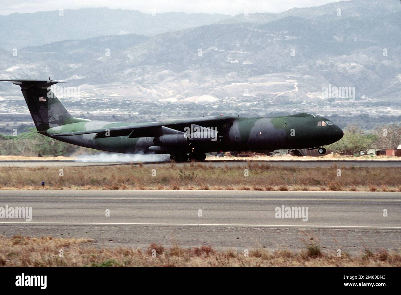 A right side view of a C-141B Starlifter aircraft from the 62nd ...