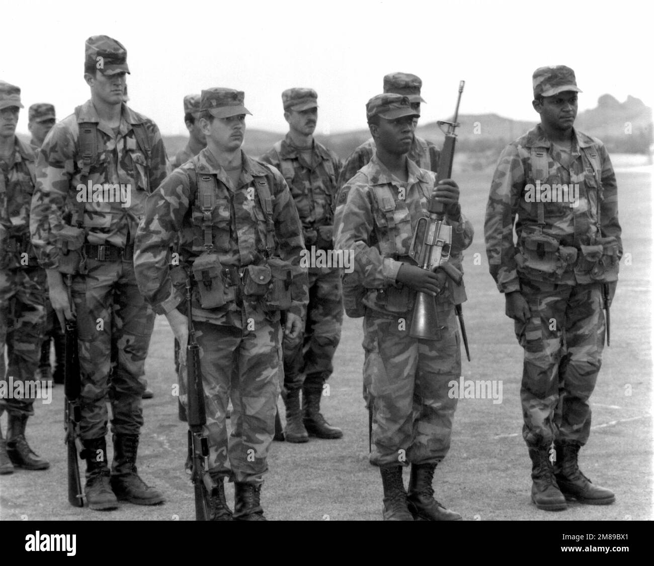 Soldiers of the 21st Infantry stand ready for inspection during their ...
