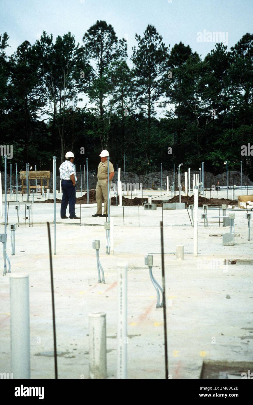 Members of the staff of the air station's resident officer in charge of ...