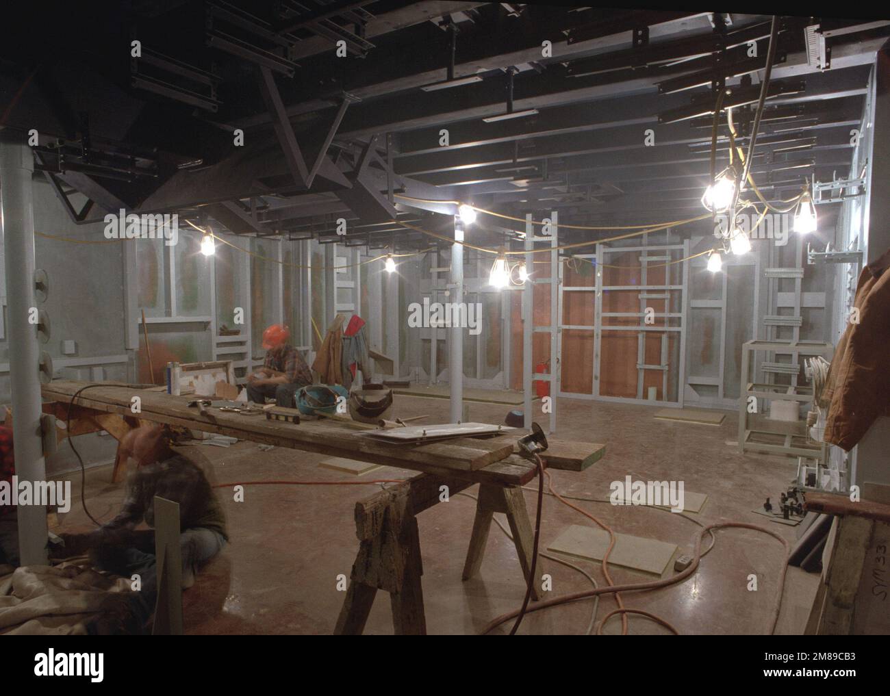 An interior view of the combat information center room looking aft and ...