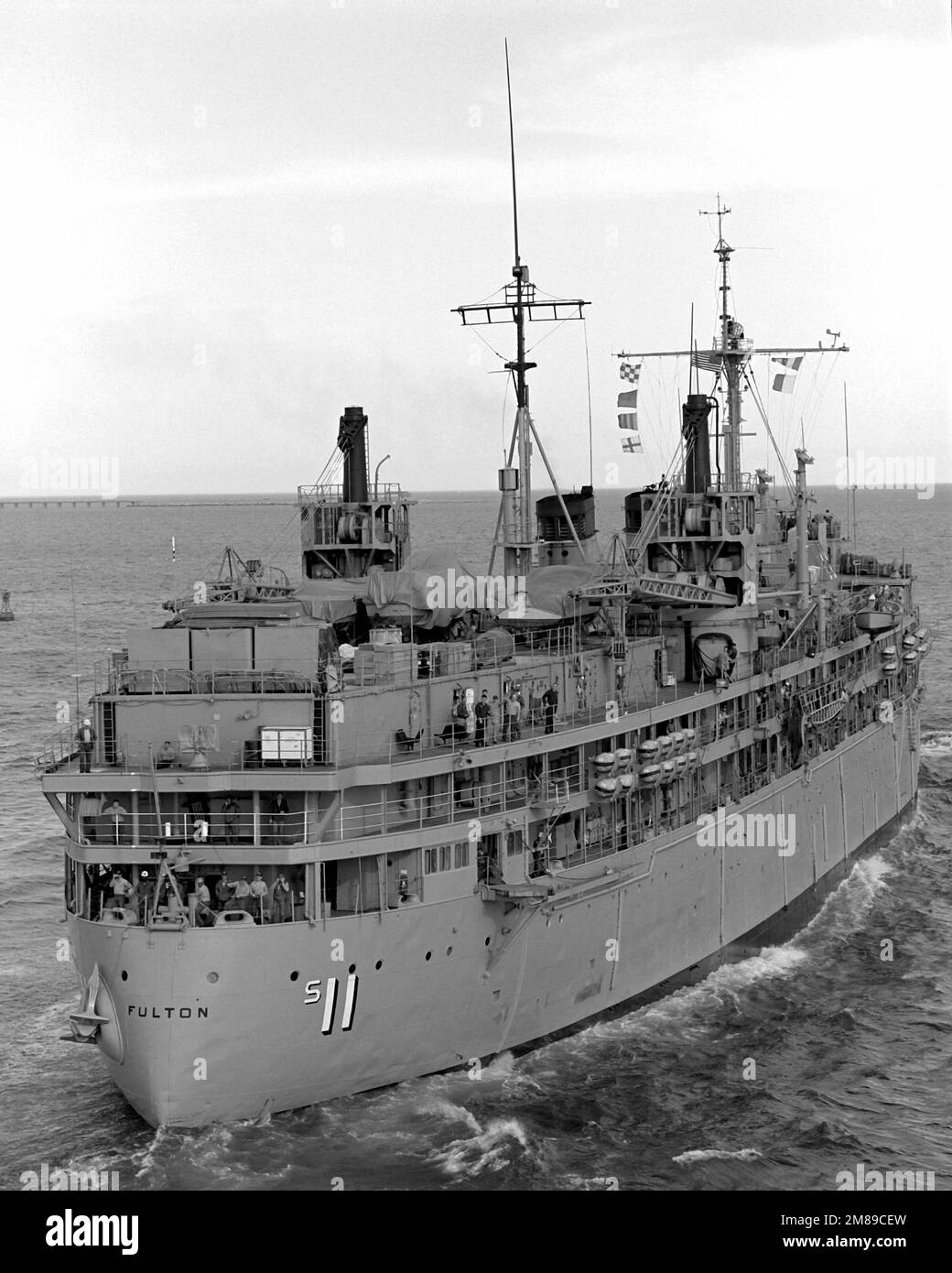A starboard quarter view of the submarine tender USS FULTON (AS-11 ...
