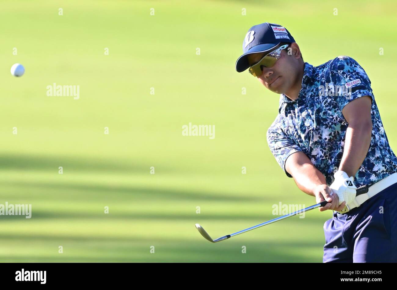 Honolulu, Hawaii, USA. 12th Jan, 2023. KAZUKI HIGA of Japan chips to ...